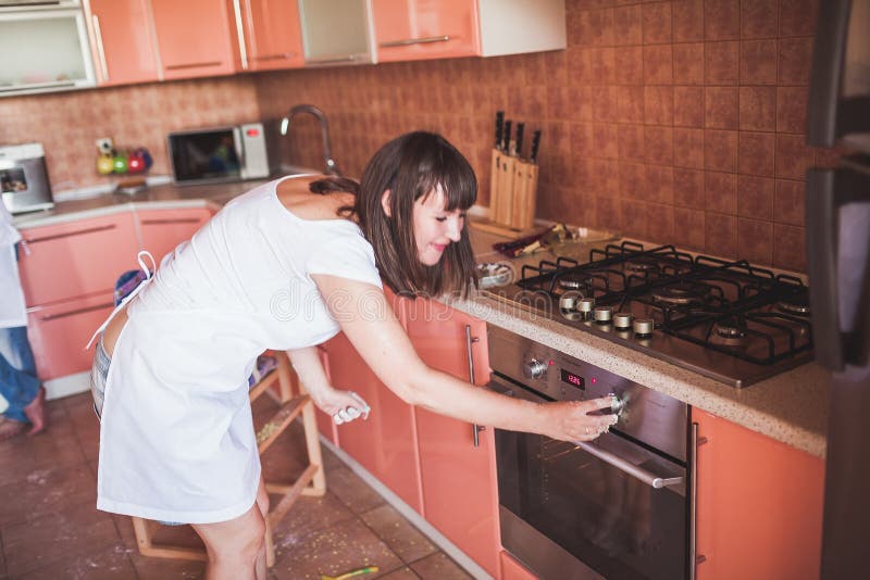 Woman cooking at kitchen stock photo. Image of food, kitchen - 49896098