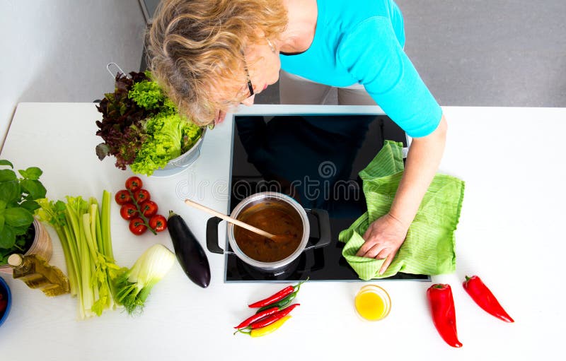 Woman Cooking in the Kitchen- View from the Top Stock Photo - Image of ...