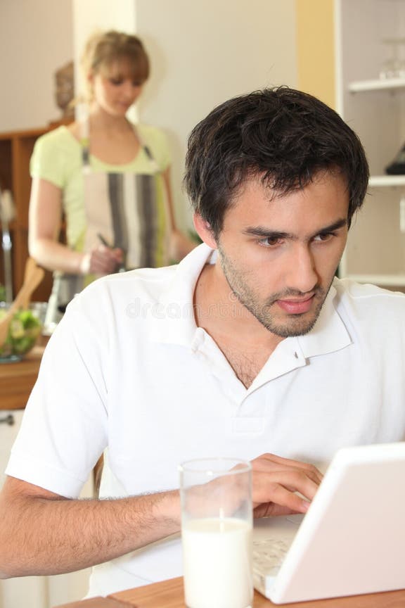 Woman cooking for man stock photo. Image of caucasian - 27390914