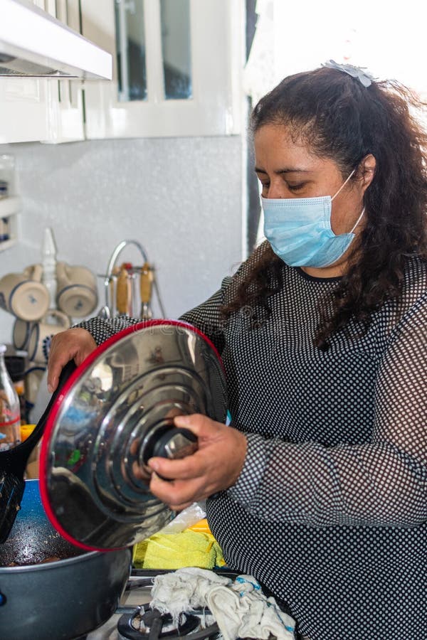 Woman Cooking Meat in Her Kitchen Stock Photo - Image of food, drink ...