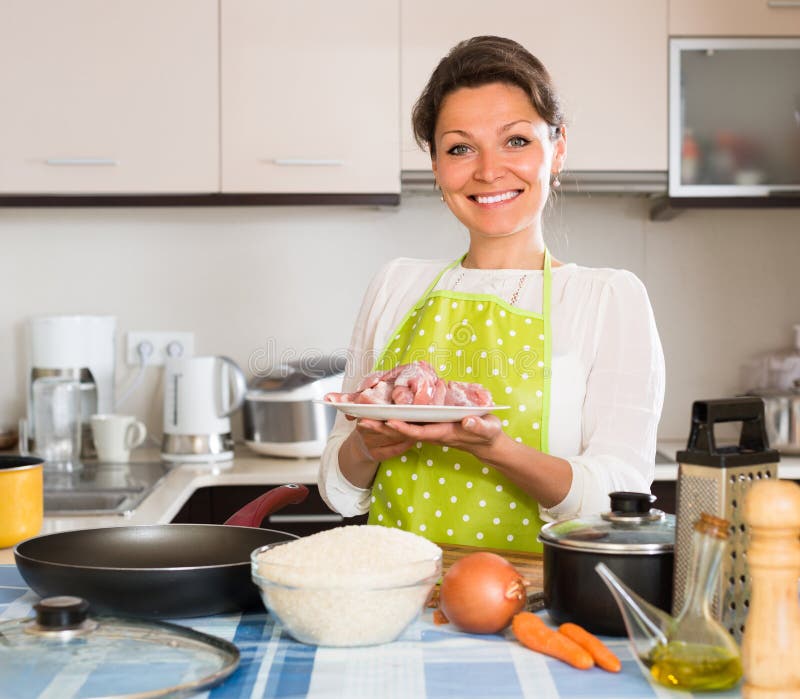 Woman Cooking Meat with Rice Stock Photo - Image of caucasian, adult ...