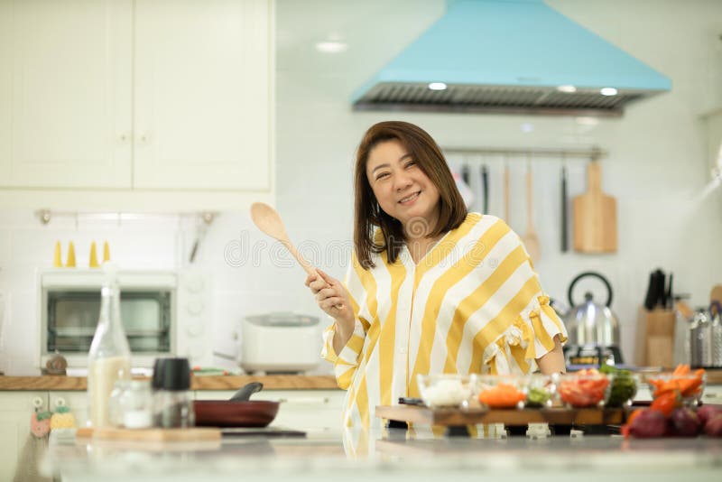 Woman Cooking Rice with Vegetables in Kitchen Stock Image - Image of ...