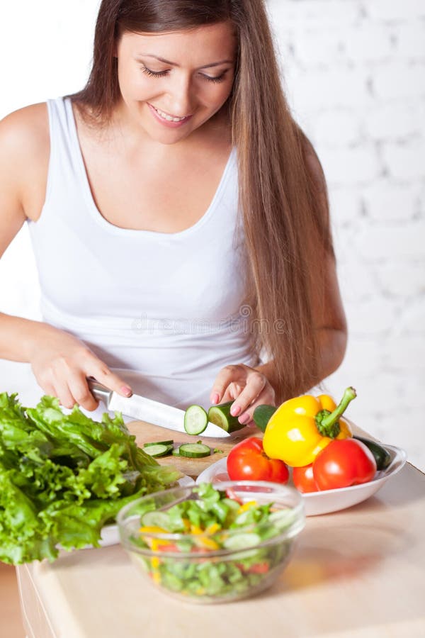Woman cooking salad stock image. Image of food, green - 26137855