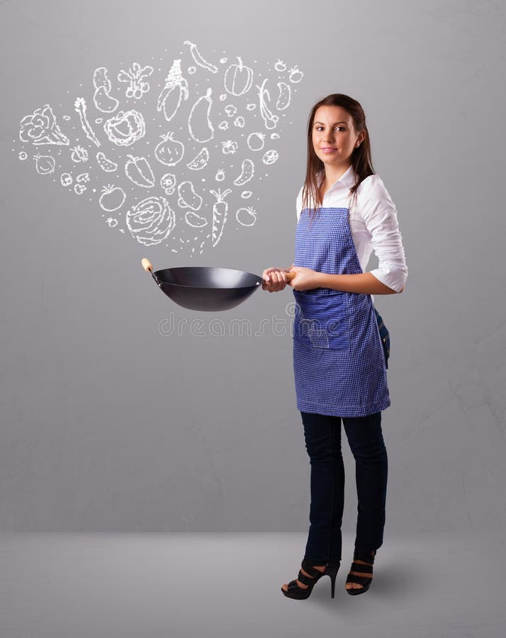 Woman cooking vegetables stock photo. Image of color - 61188576