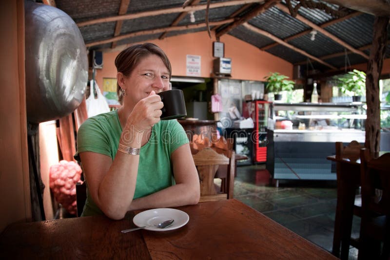 Woman in a Costa Rican Cafe Stock Photo - Image of mature, restaurant ...