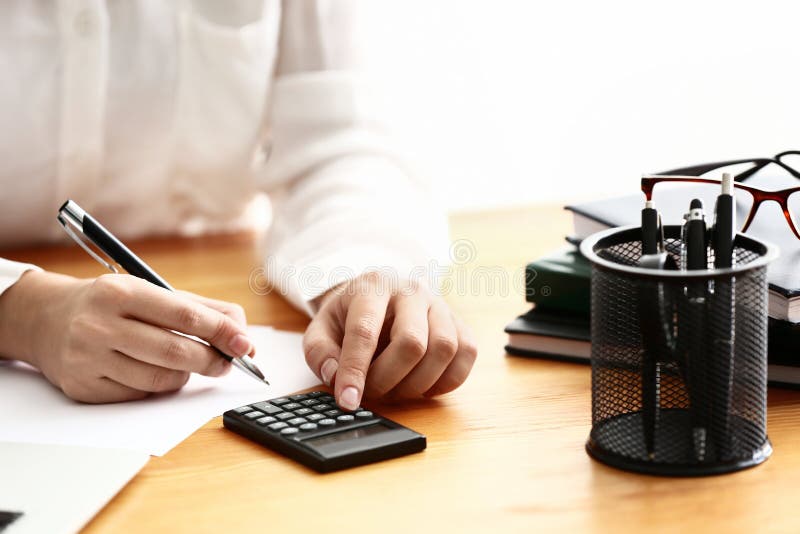 Woman Counting on Calculator at Table. Concept of Study Stock Image ...