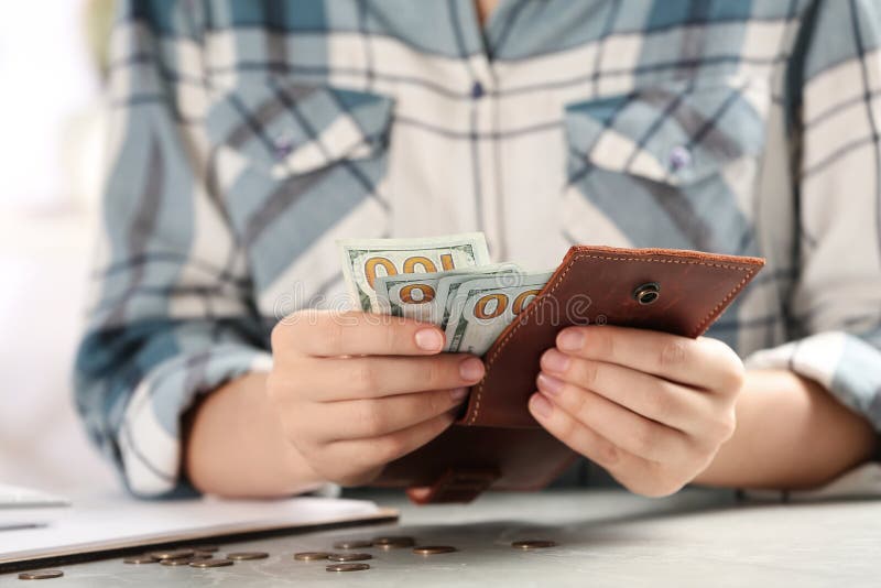 Woman Counting Money at Light Grey Table Stock Photo - Image of adult ...