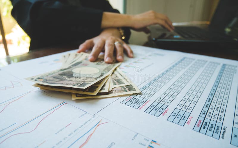 Woman is Counting Money with Statement Paper and Use Computer Financial ...