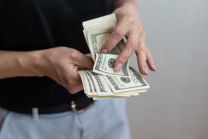 Woman Counting Money on a White Background. Stock Photo - Image of ... Woman Counting Money on a White Background. Stock Photo - Image of ...