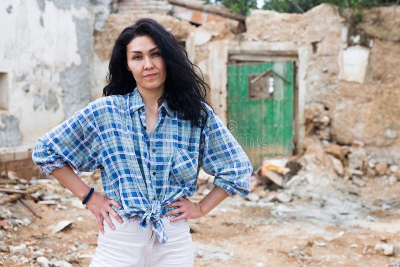 Woman in the Courtyard of Destroyed House Stock Photo - Image of ...