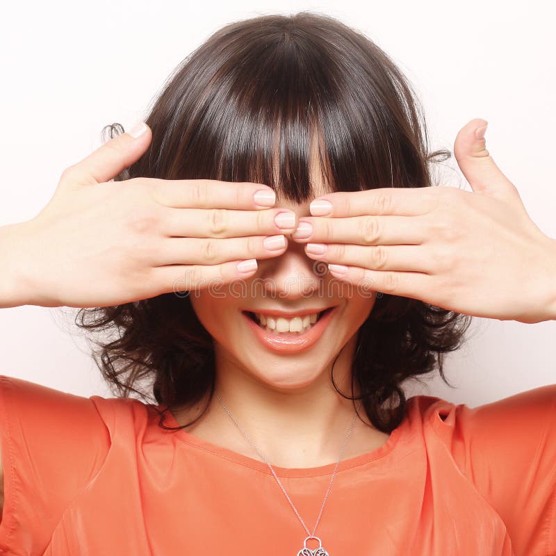 Woman covering her eyes stock photo. Image of eyes, expression - 137944498