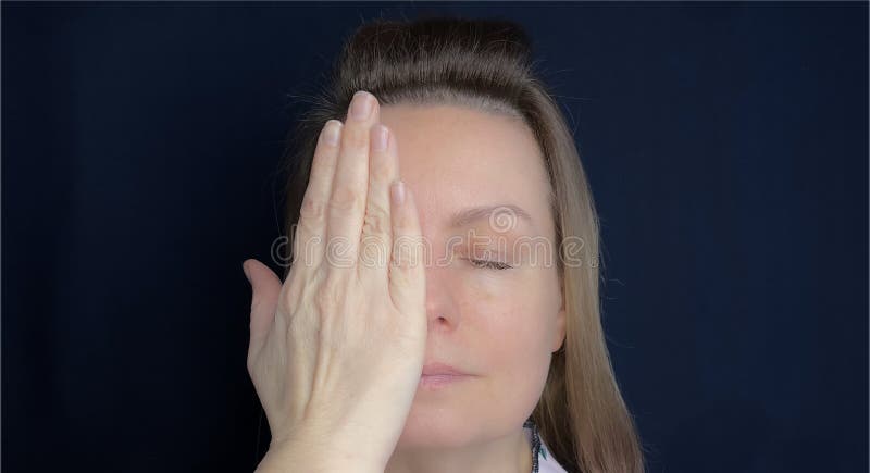 The Woman Covers the Floor of Her Face with Her Palm Stock Image ...