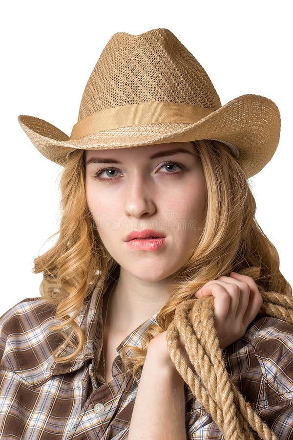 A Woman Is In A Cowboy Hat With A Rope On Her Shoulder. Stock Image ...