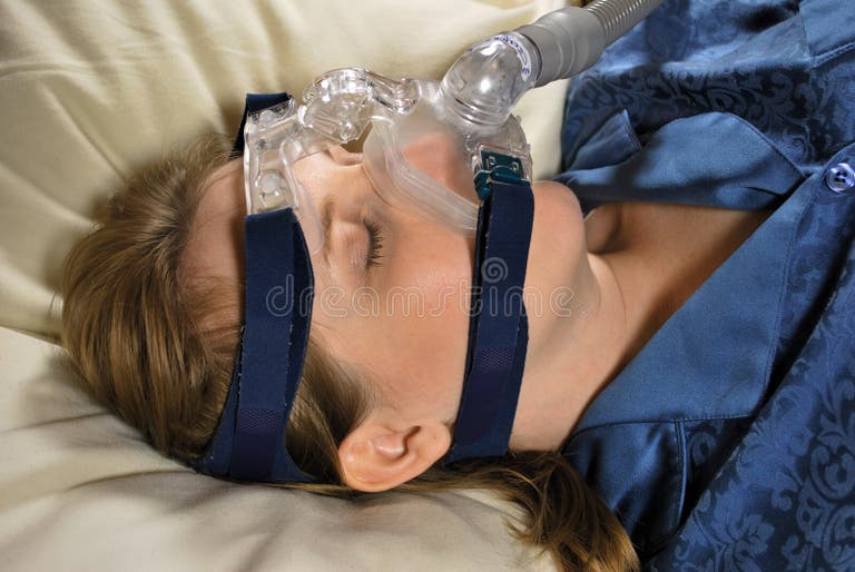 Woman with CPAP Mask stock image. Image of comforter - 12608473