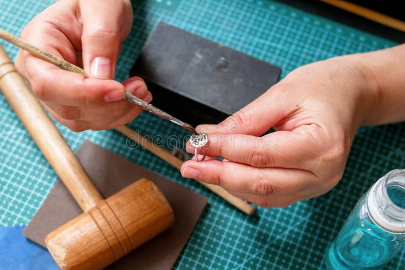 Woman Crafting Handmade Silver Ring in Workshop. Ring Making Process in ...