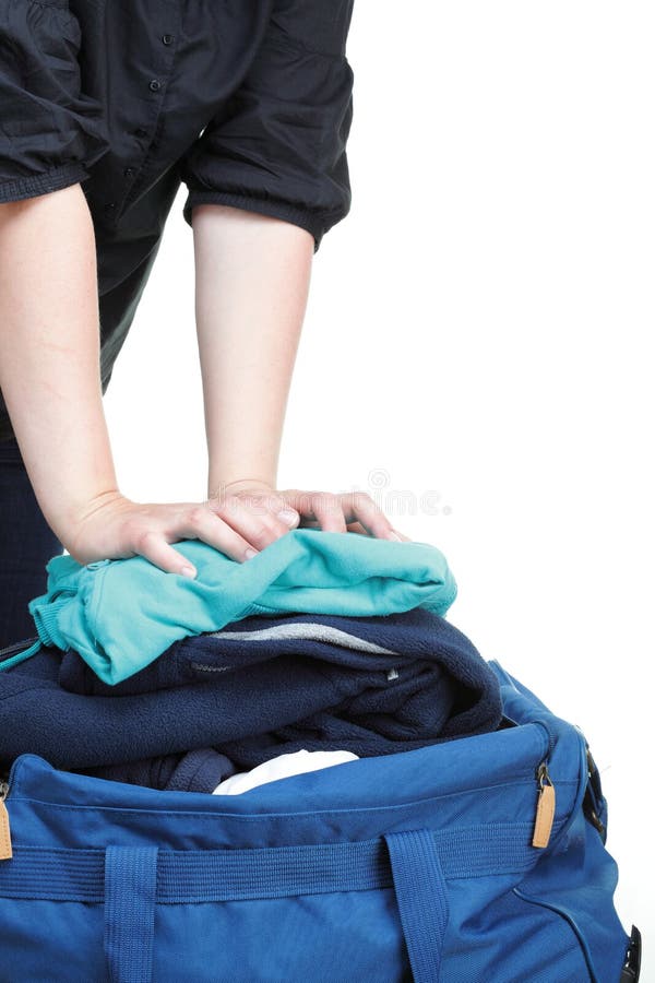 Woman Crammed Clothes into One Bag Stock Image - Image of caucasian ...