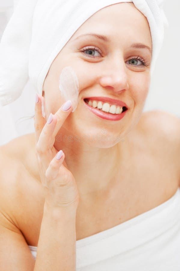 Woman with Cream on Her Face Stock Image - Image of hands, lips: 7850555