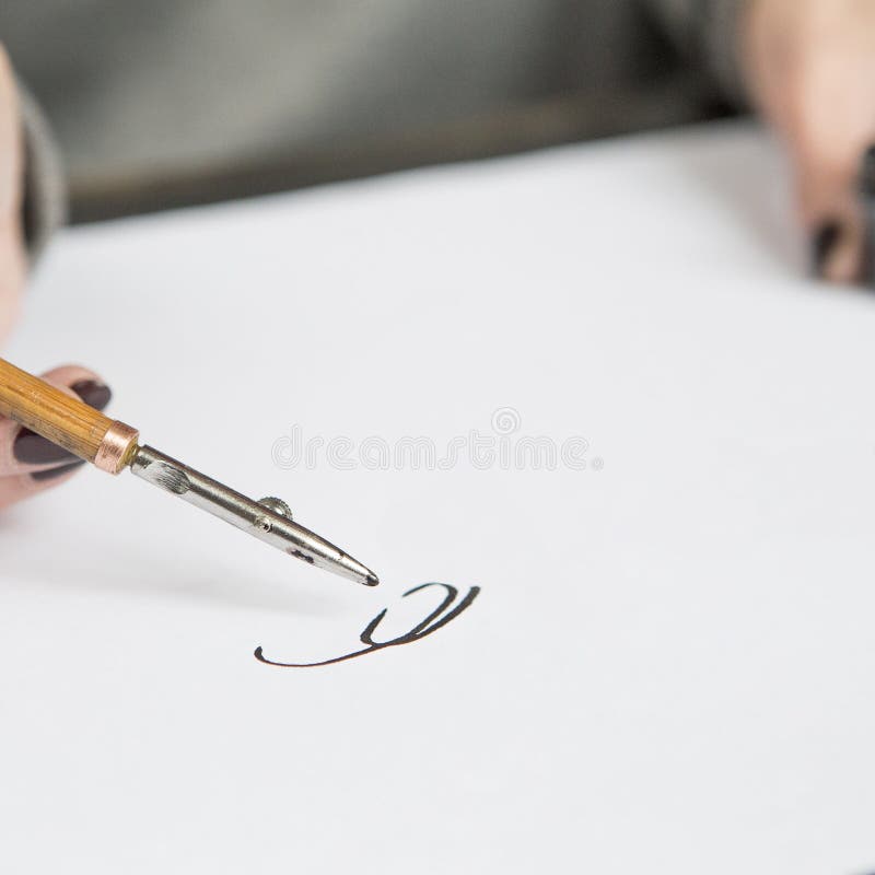 Woman Create a Calligraphy Design Work Using Drawing Pen and Ink Stock ...