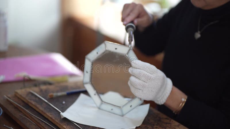 A Woman Creating Stained Glass Works Stock Video - Video of tourism ...