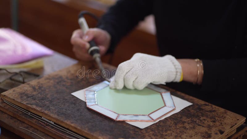 A Woman Creating Stained Glass Works Stock Video - Video of workshop ...