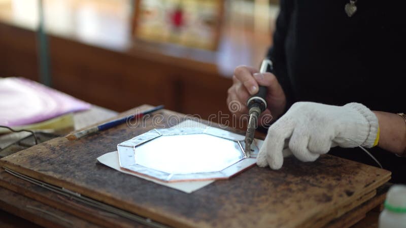 A Woman Creating Stained Glass Works Stock Video - Video of artisan ...