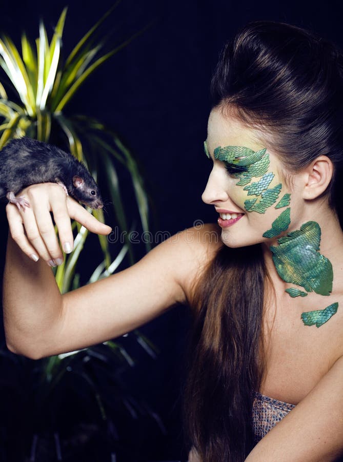 Woman with Creative Make Up Like Snake with Rat in Her Hands Stock ...