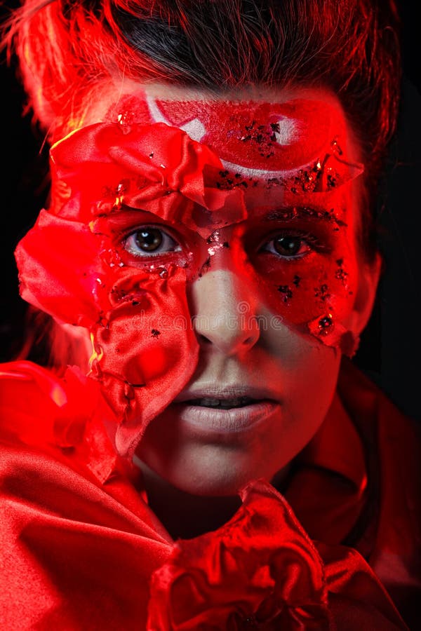 Woman with Creative Red Face Art Stock Photo - Image of dark, colored ...