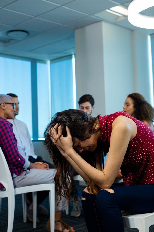 Woman Giving Presentation To Her Colleagues in Conference Room Stock ...