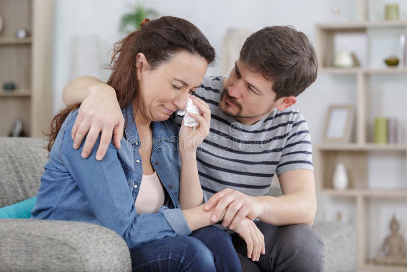 Woman Crying while Man Calming Stock Photo - Image of helping, crying ...