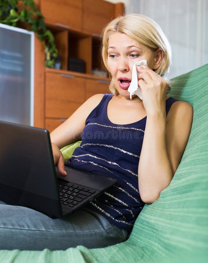 Woman Crying while Using Laptop Stock Image - Image of casucasian ...