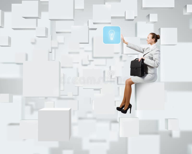 Woman on cube stock image. Image of engineer, energy - 44916095