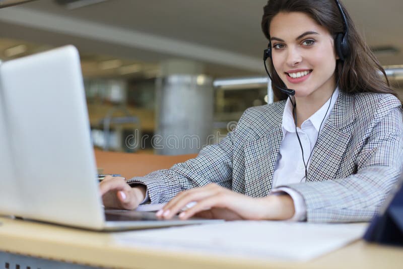 Woman Customer Support Operator with Headset and Smiling Stock Photo ...