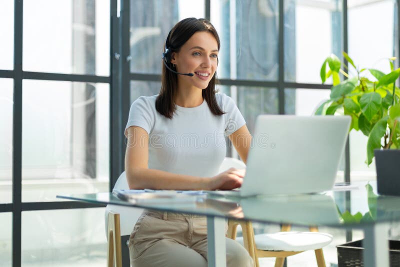 Woman Customer Support Operator with Headset and Smiling Stock Photo ...