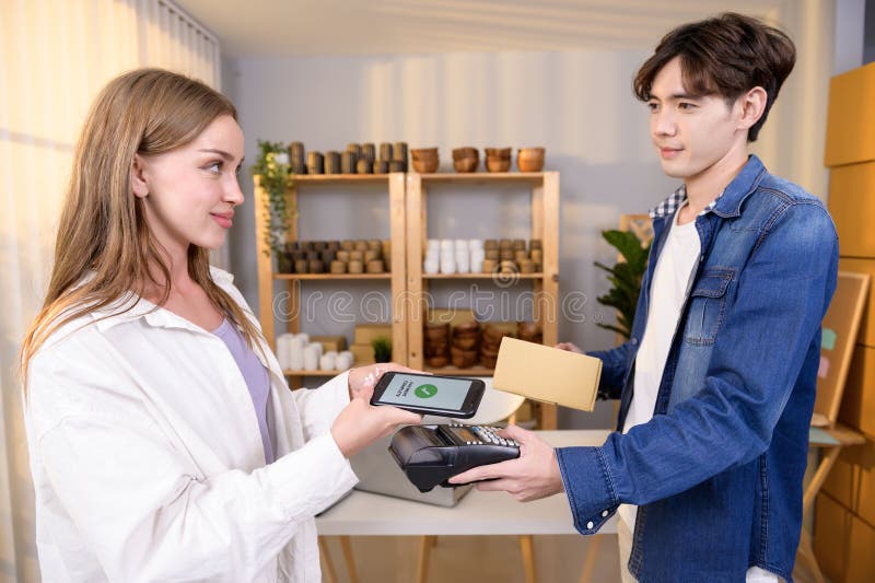 Woman Customer Using QR Code Payment Via Smartphone for Paying at Shop ...