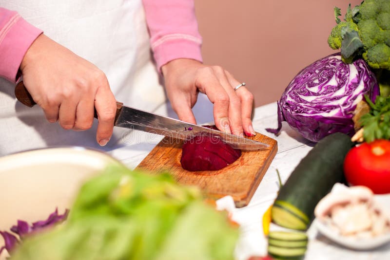 Woman Cut Beetroot on Slices Stock Photo - Image of hand, healthcare ...