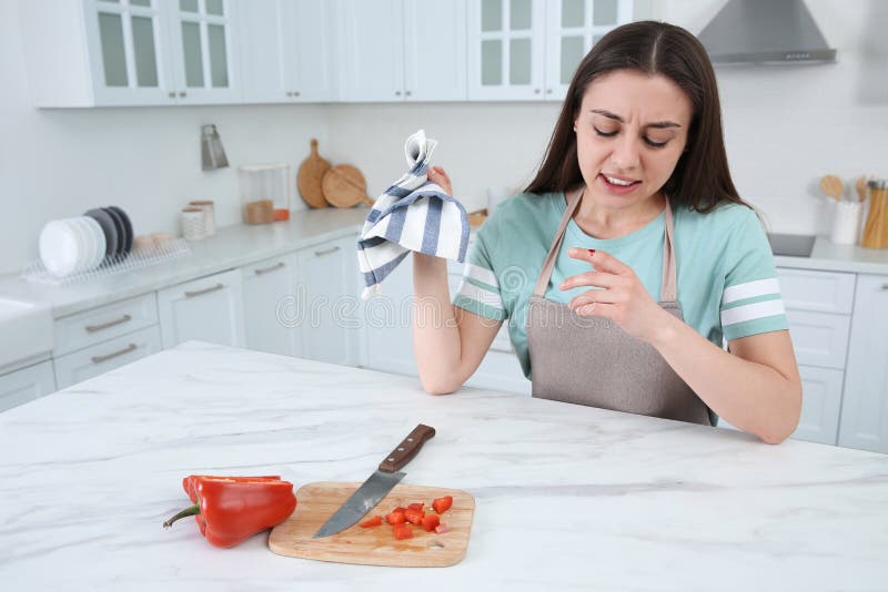 Woman Cut Finger with Knife while Cooking Stock Photo - Image of chef ...