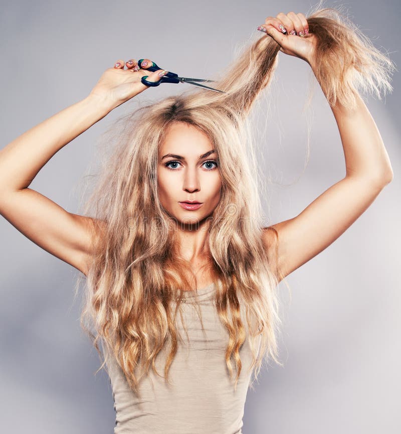 Woman cut her long hair stock image. Image of care, health - 49058103