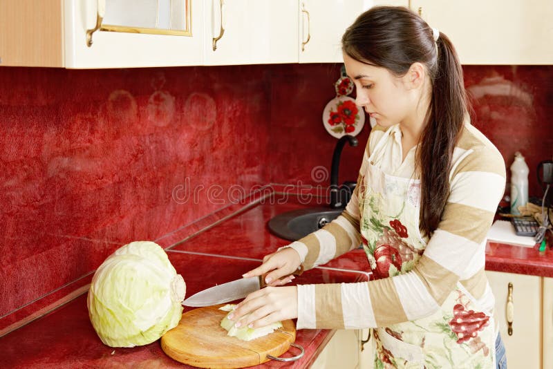 Woman cutting cabbage stock photo. Image of slicing, vegetable - 23788906