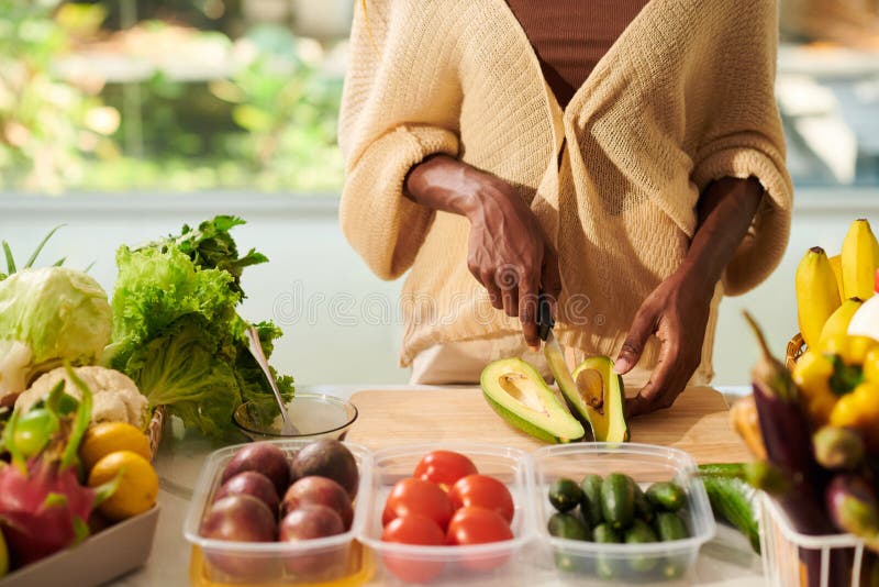 Woman Cutting Fresh Avocado Stock Photo - Image of vegetable, avocado ...