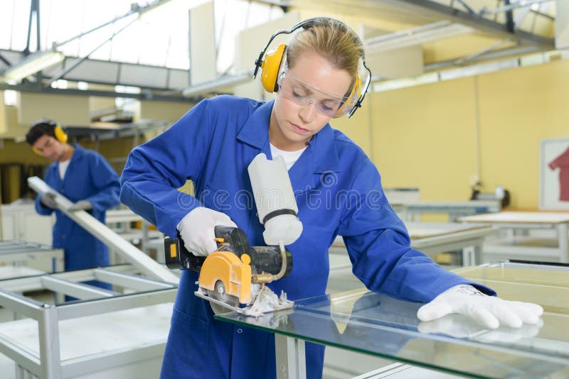Woman Cutting through Glass with Rotary Blade Stock Image - Image of ...