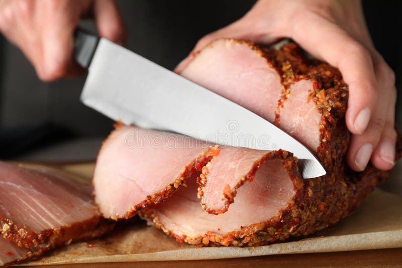 Woman Cutting Ham at Table. Festive Dinner Stock Photo - Image of ...