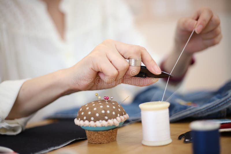 Woman cutting the thread stock image. Image of eating - 242526667