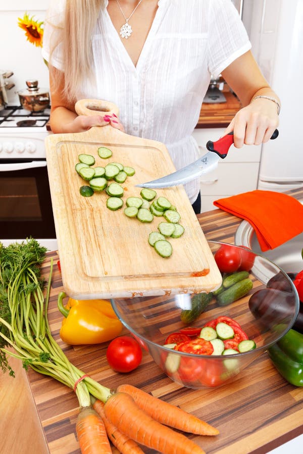 Woman cutting vegetables stock image. Image of breakfast - 29531445