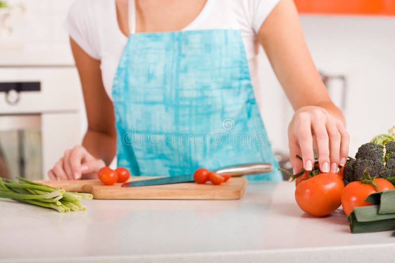 Woman Cutting Vegetables in a Kitchen Stock Photo - Image of lifestyle ...