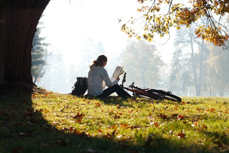 Woman Cyclist with Read the Map Stock Image - Image of backpack, enjoy ...