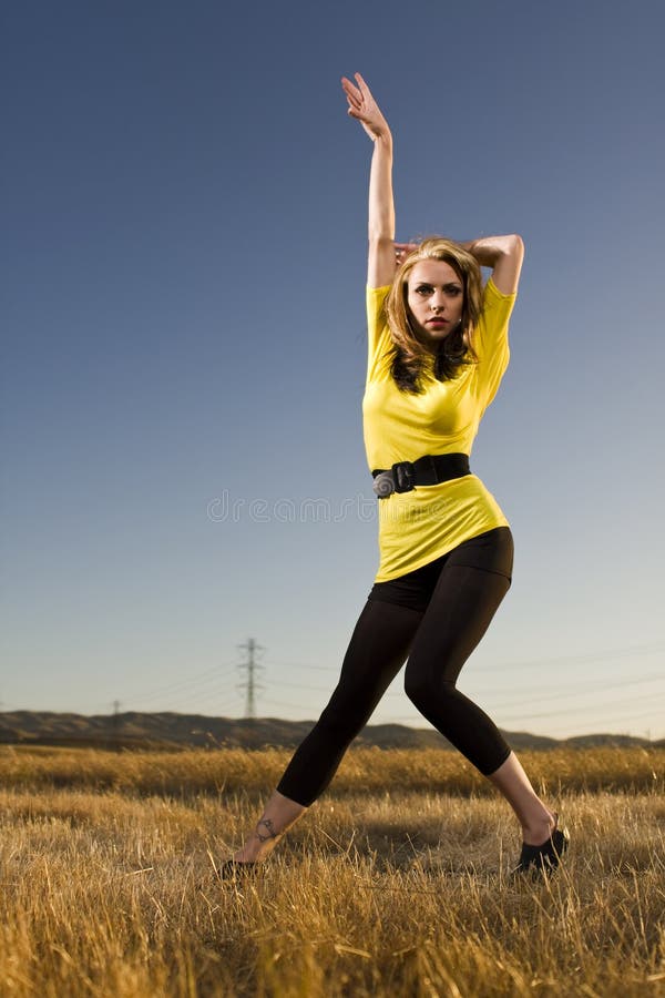 Woman in a Dance Pose in a Field Stock Photo - Image of healthy, human ...