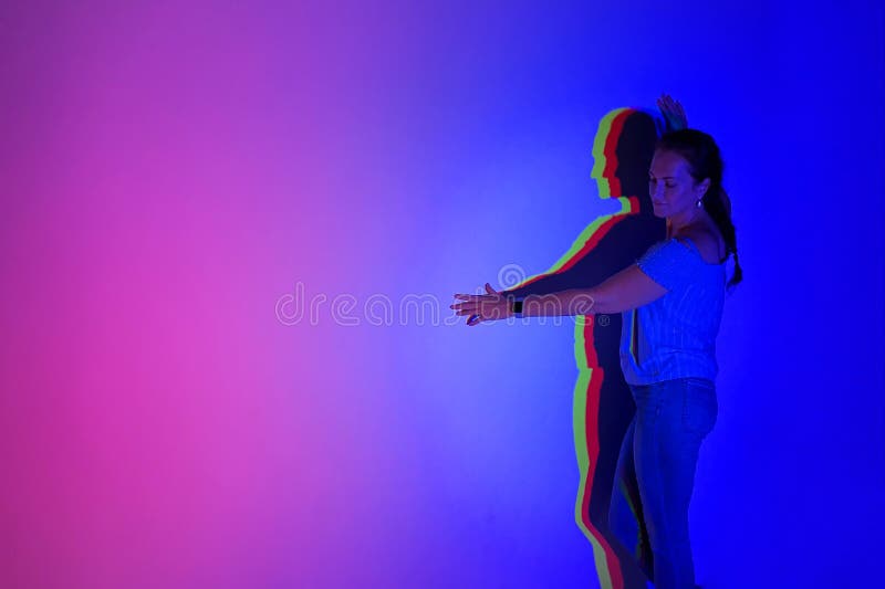 A Woman Dancing with a Colored Shadow Stock Photo - Image of concert ...