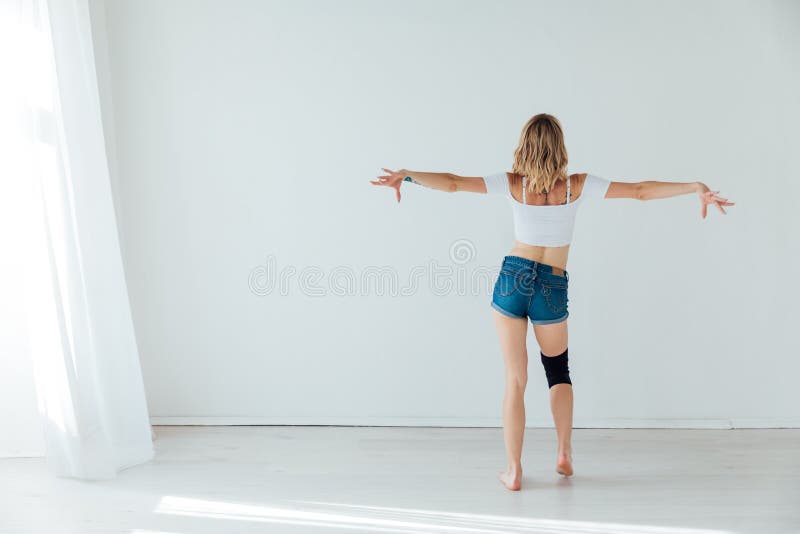 A Woman Dancing in a Dance Studio in a Dance Hall in a Dance Studio ...