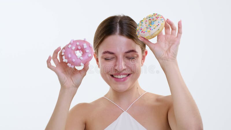Woman Dancing with Donuts on White Background Stock Footage - Video of ...