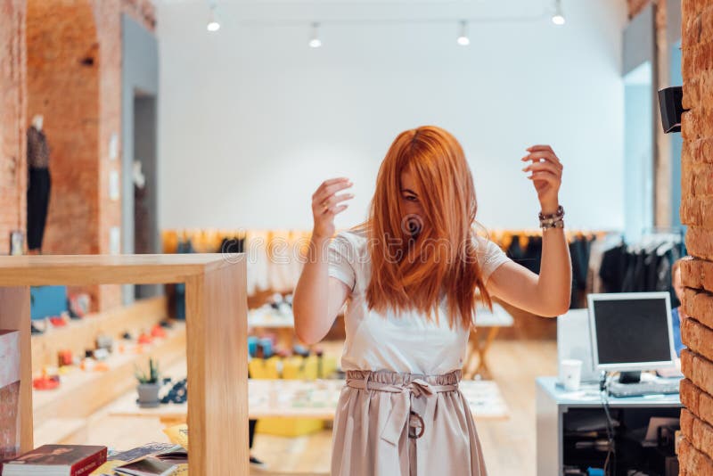 The Woman is Dancing in the Store Stock Photo - Image of glamour ...